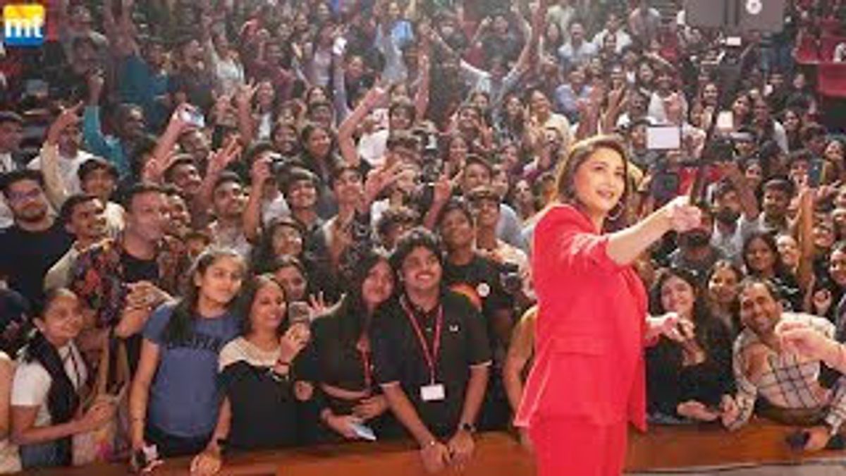Madhuri Dixit Looks Gorgeous In Red Pant Suit, interacts With fans At ...