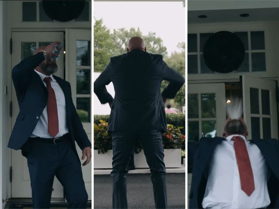 Triple H performs his iconic water spit in White House